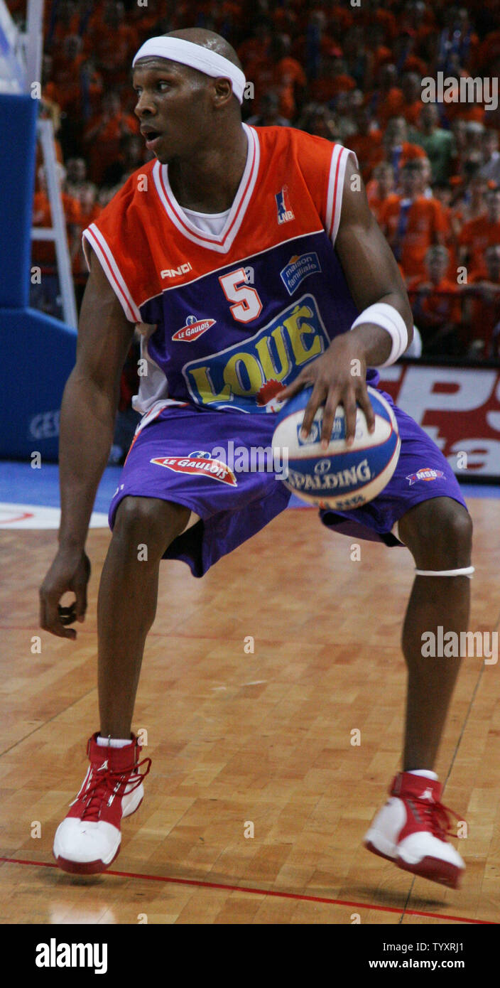 Le Mans guard Kenny Gregory brings the ball up the court at the French ...
