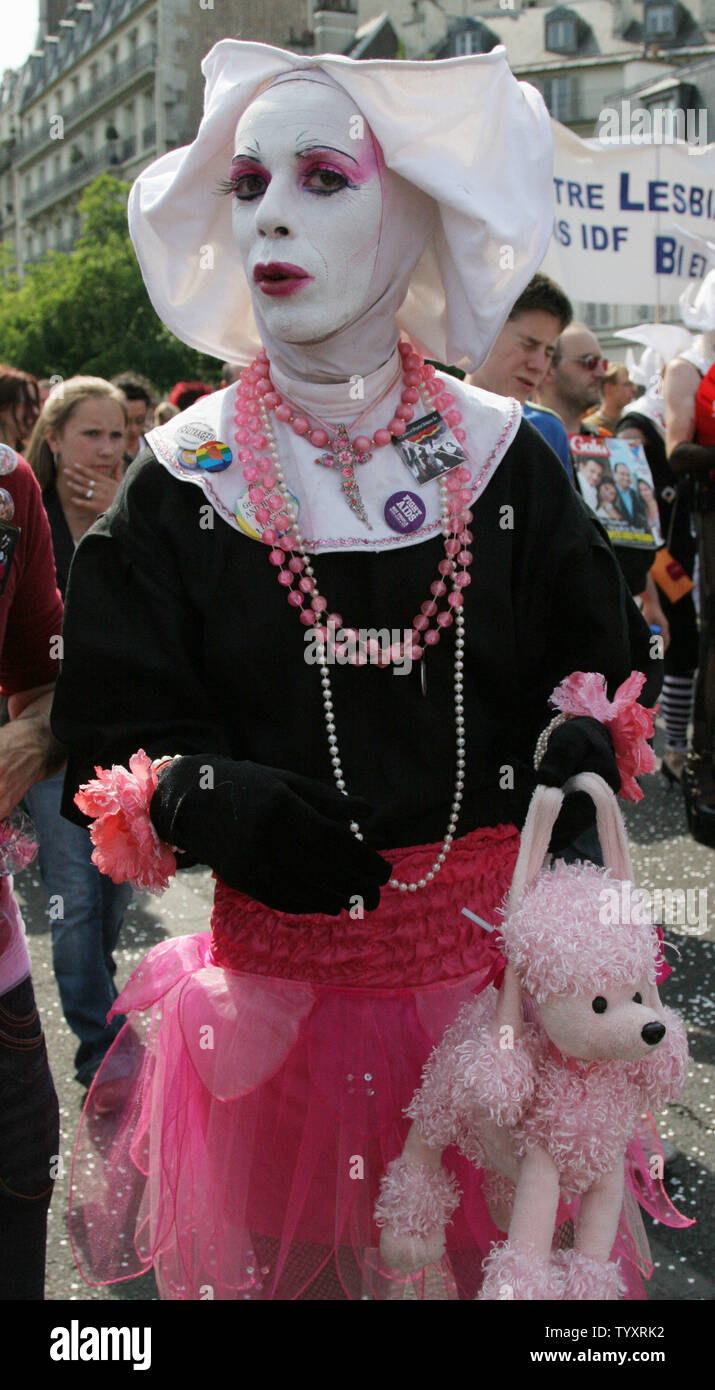 A participant in the annual Gay Pride Parade marches through the ...