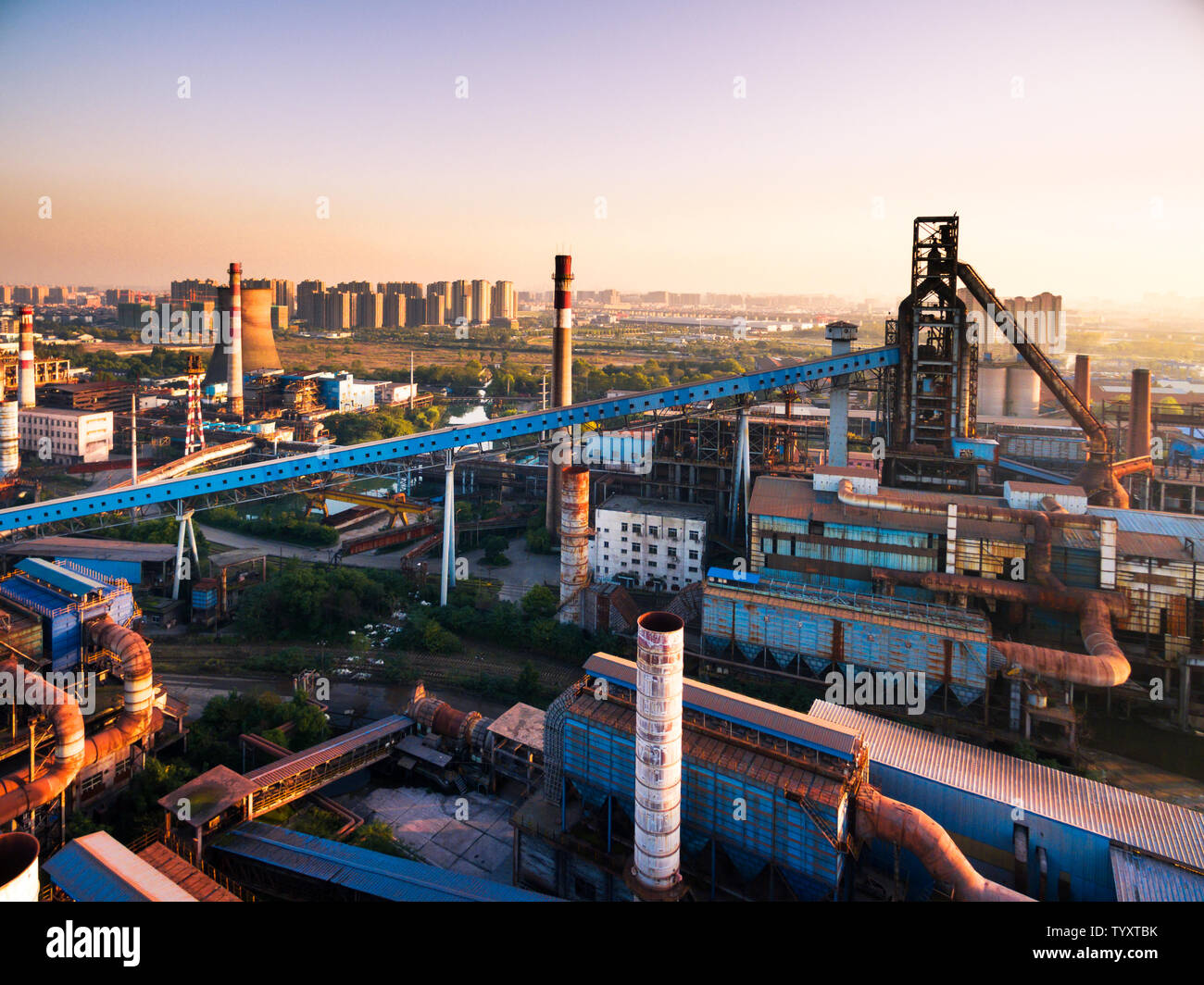 constructions in modern power station at sunrise Stock Photo - Alamy