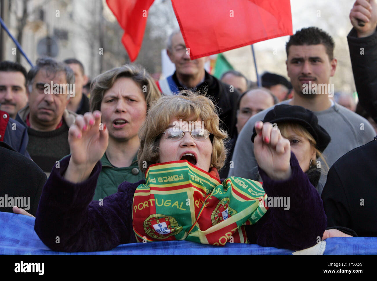 Members of the Portuguese community in France demonstrate in the ...