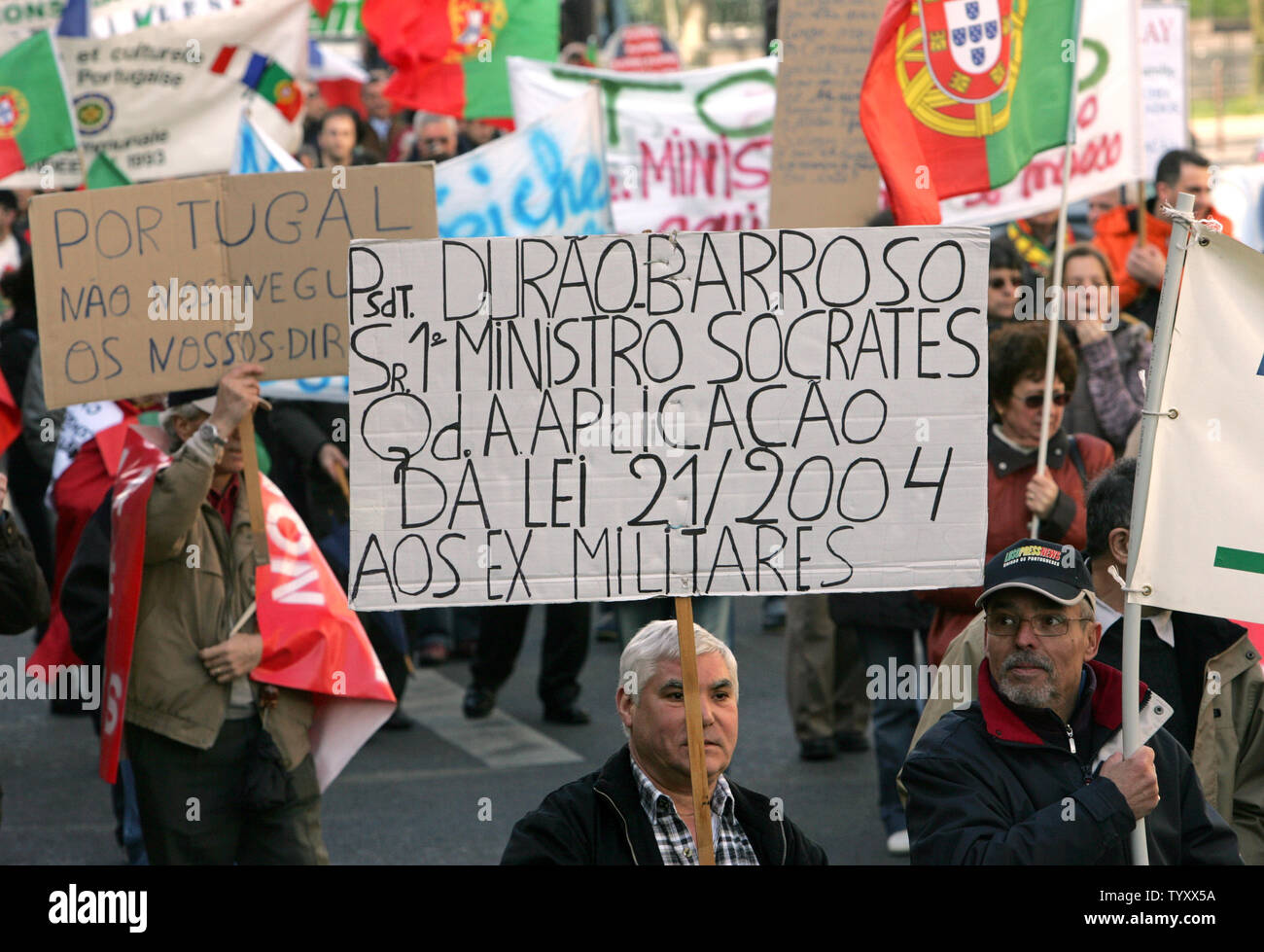 Members of the Portuguese community in France demonstrate in the ...