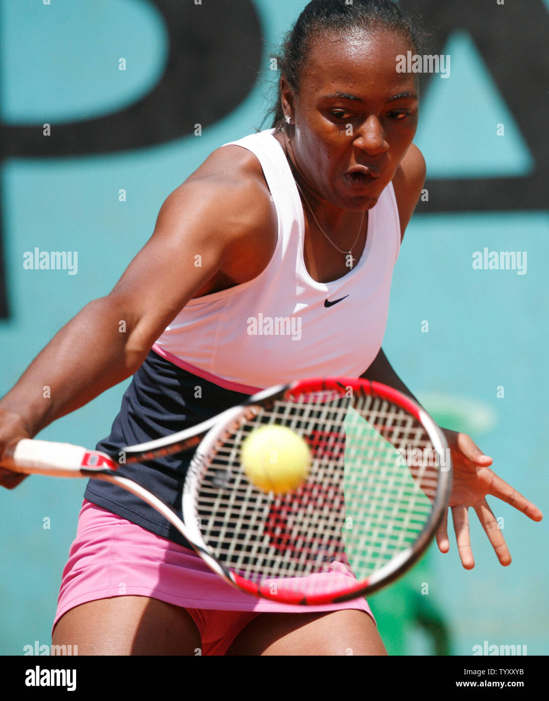 American Shenay Perry hits a backhand during her first round match ...
