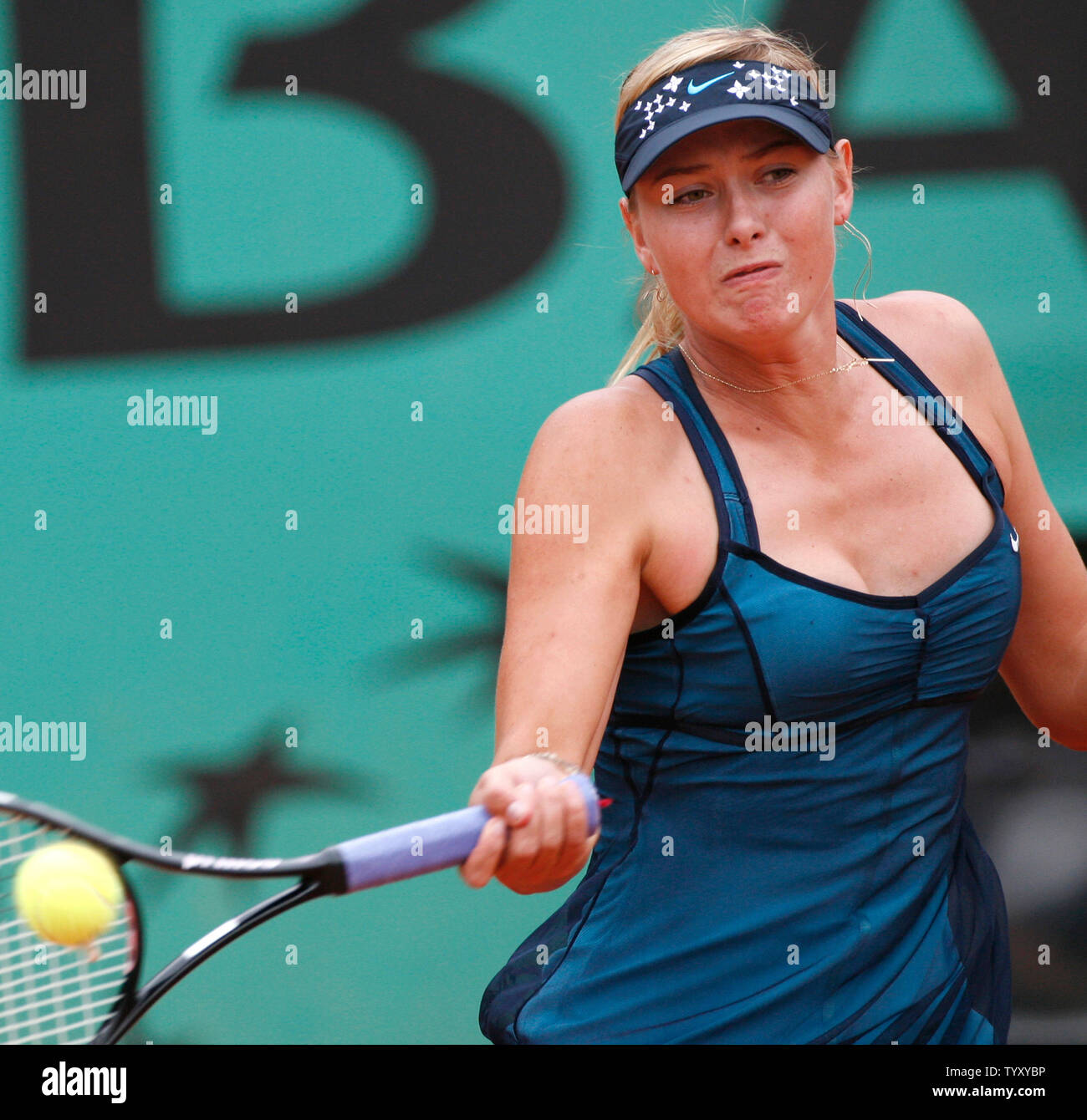 Russian Maria Sharapova hits a forehand during her semi-final match ...