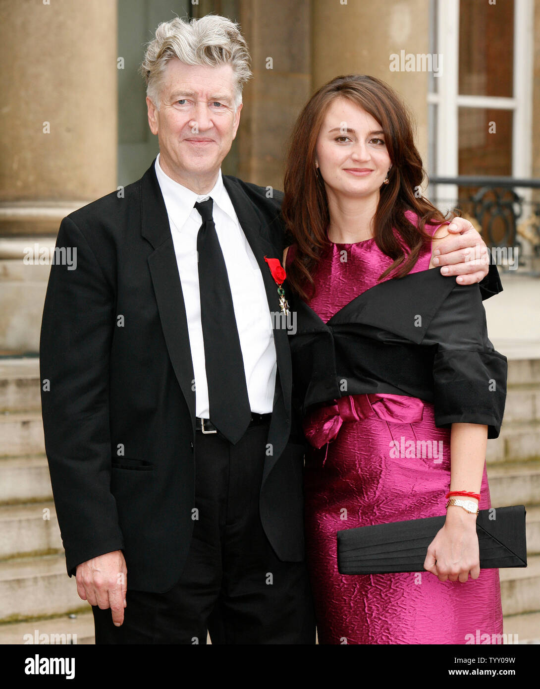 Director David Lynch and actress Emily Stofle leave the Elysee ...