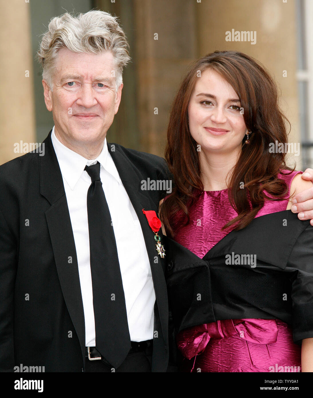Director David Lynch and actress Emily Stofle leave the Elysee ...