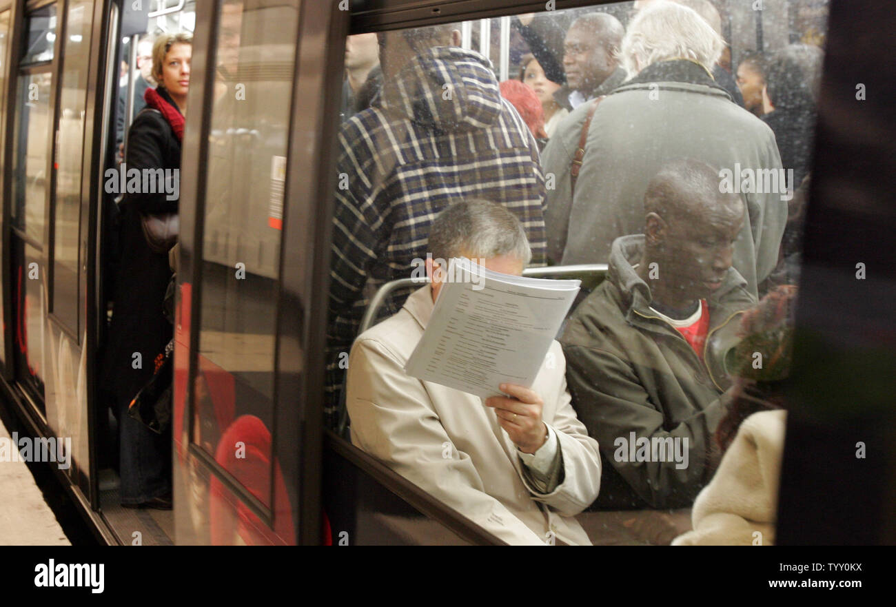 Passengers cram into a Paris subway on the first day of a nationwide ...