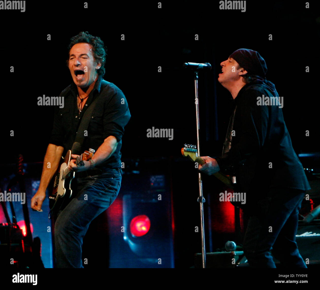 Bruce Springsteen (L) and Little Steven (Steven Van Zandt) perform in ...