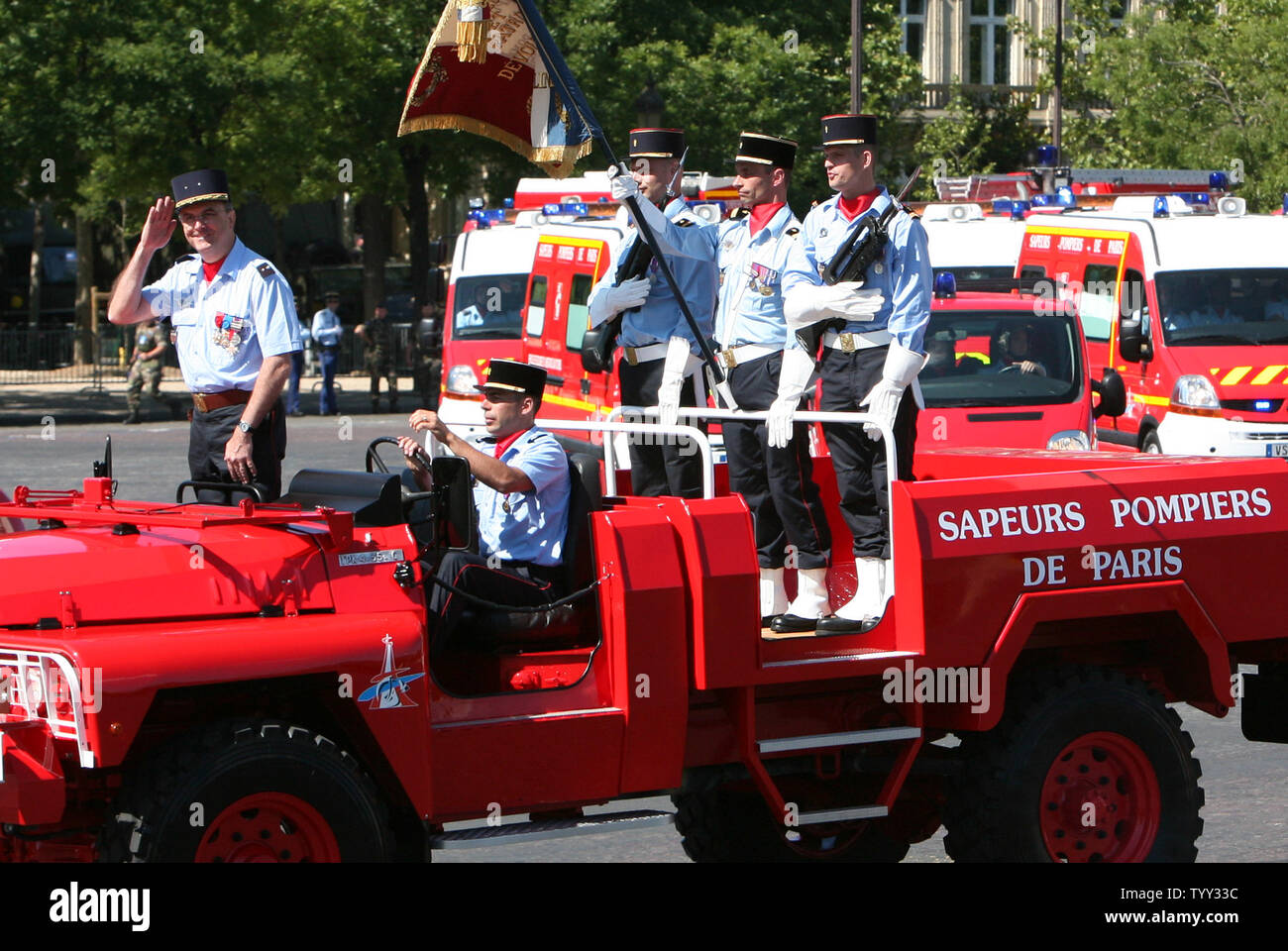 French firemen join the annual Bastille Day military parade along the ...