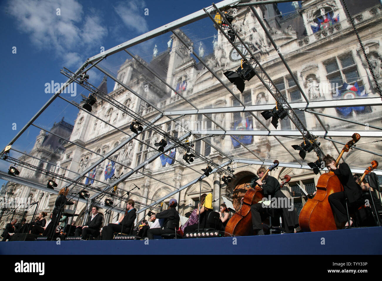 The Ensemble Orchestra of Paris performs a concert in front of city ...