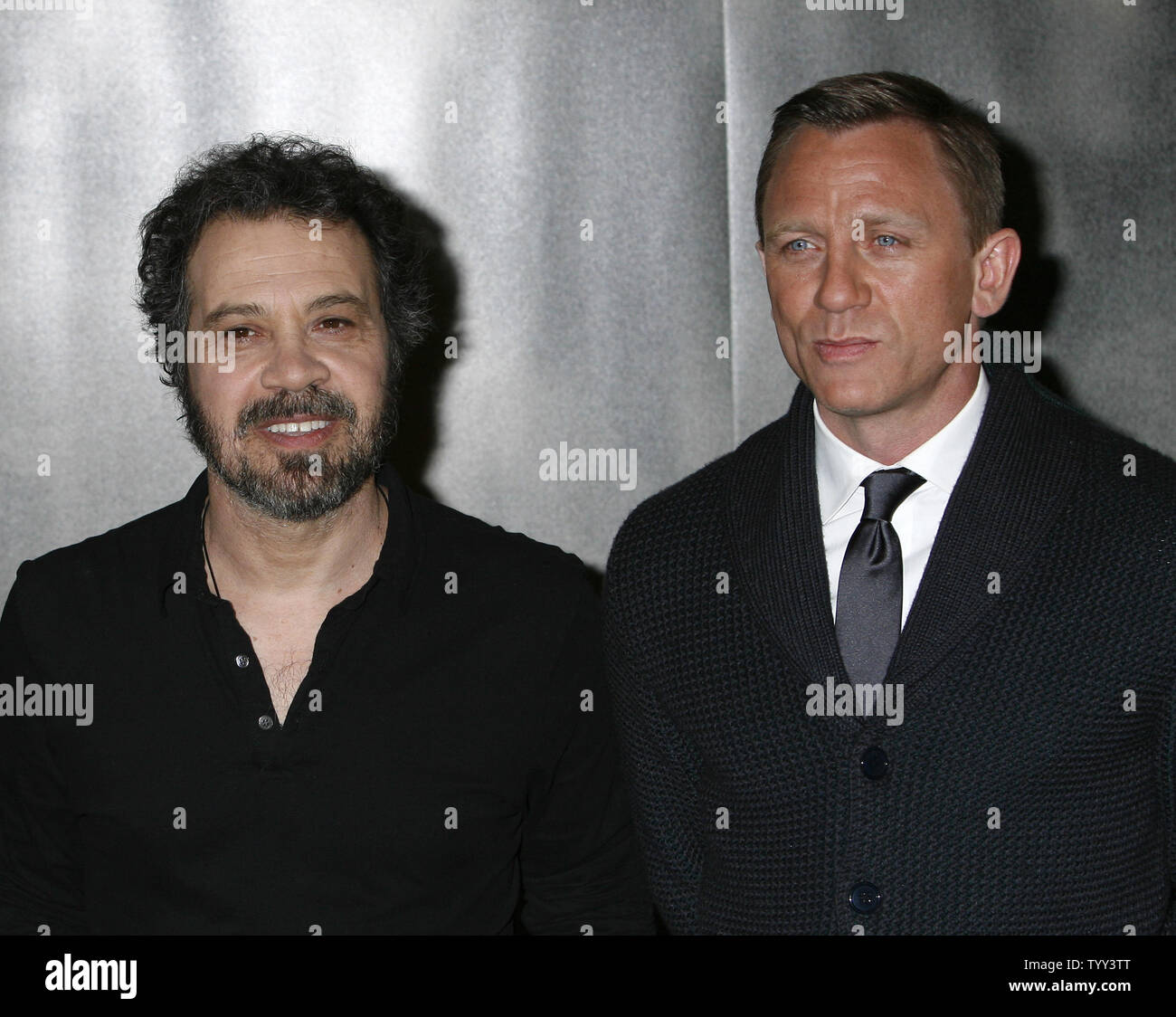 Director Edward Zwick (L) and actor Daniel Craig arrive at a photocall ...