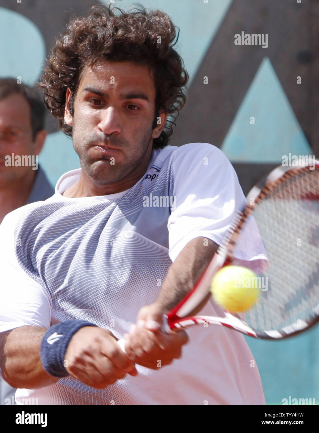 Maximo Gonzalez of Argentina hits a shot during his French Open first ...