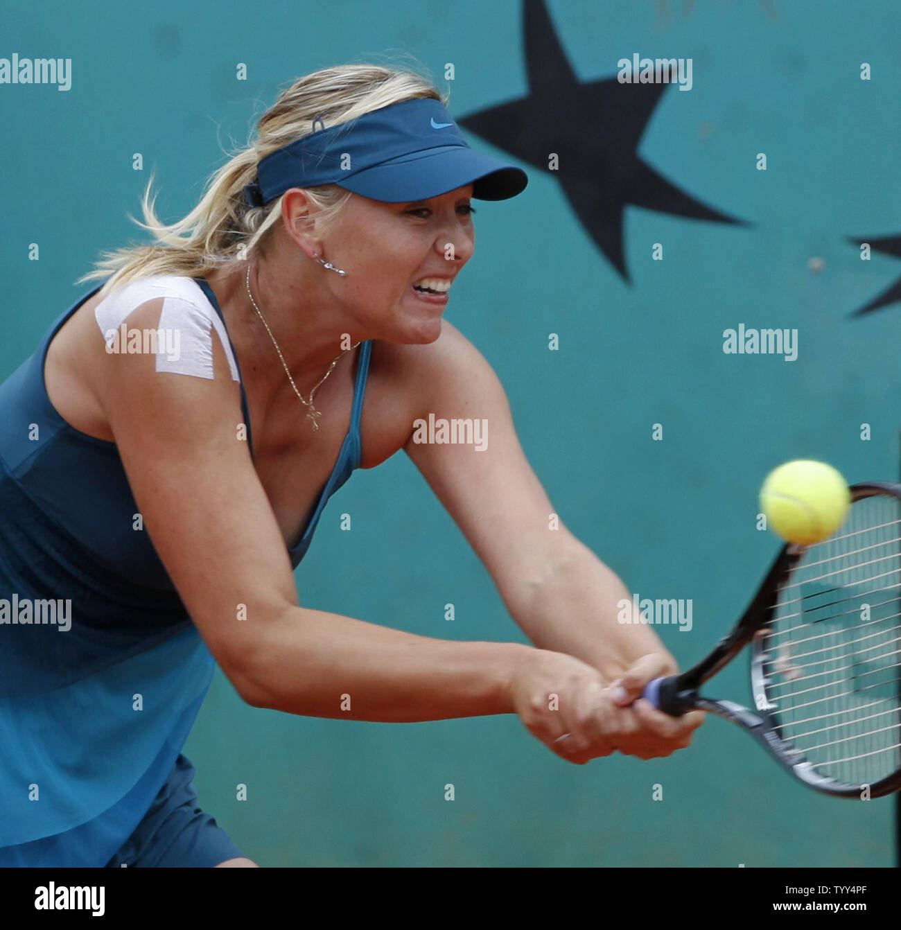 Russian Maria Sharpova hits a shot during her French Open second-round ...