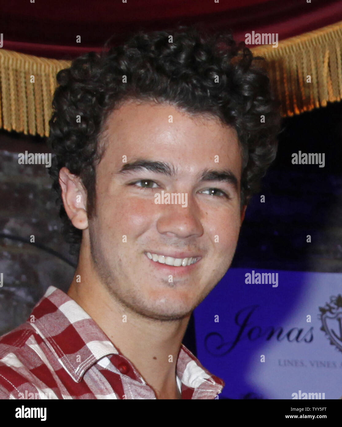 Kevin Jonas of The Jonas Brothers arrives at a press conference before ...