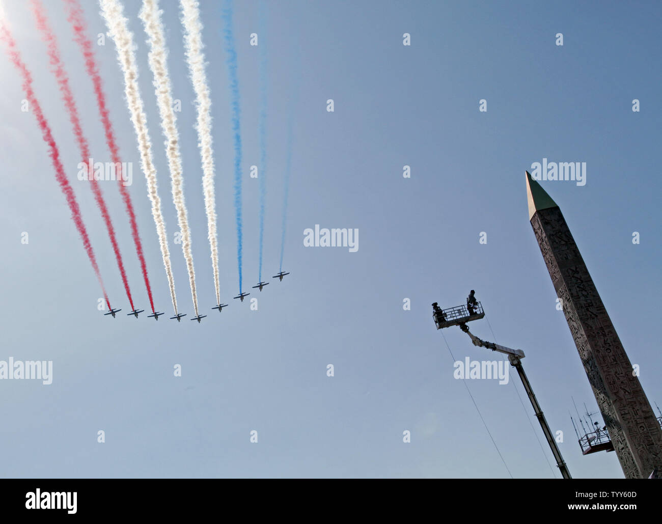 French military jets fly over the Place de la Concorde during the ...