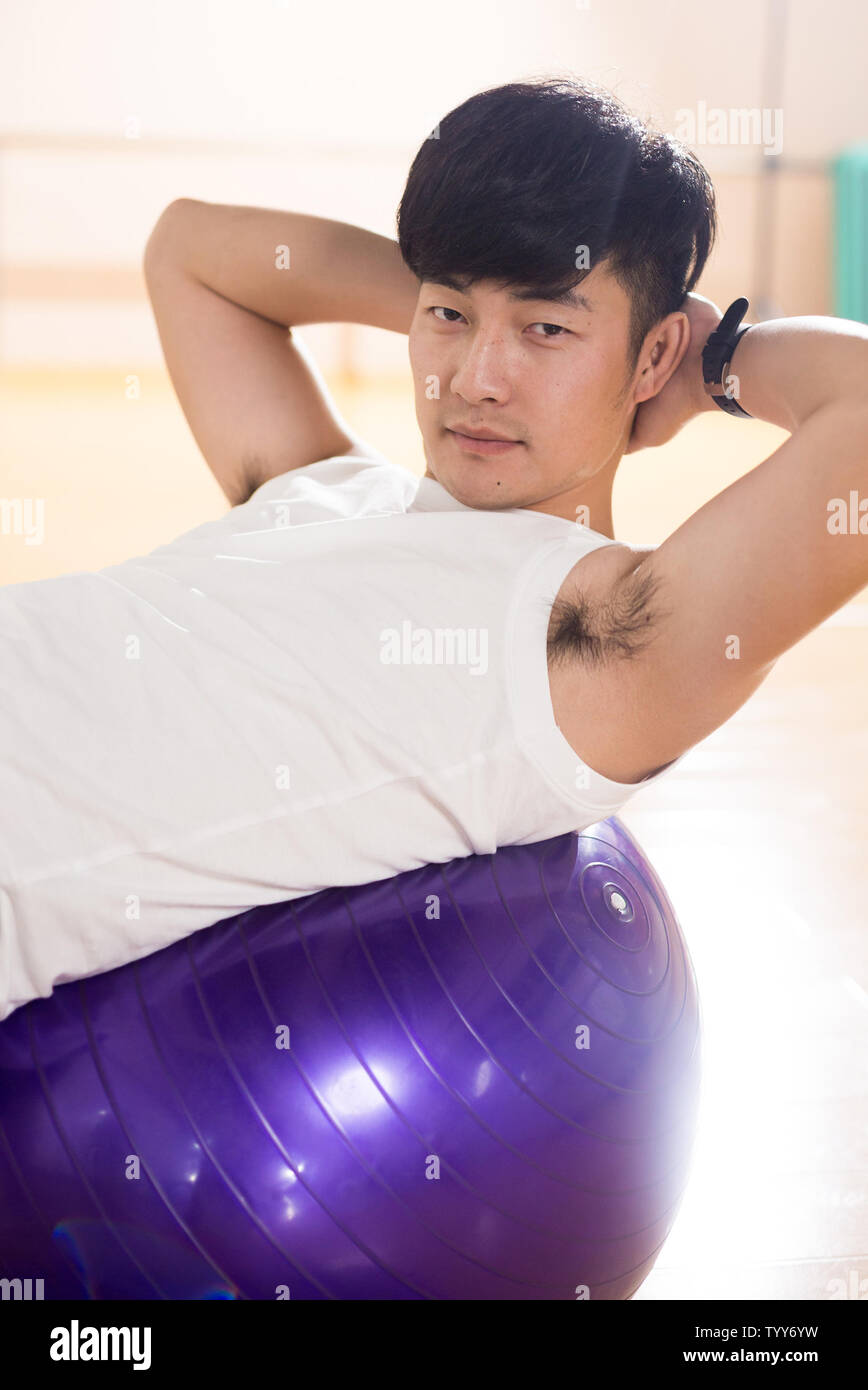 Young chinese man muscular hi-res stock photography and images - Alamy