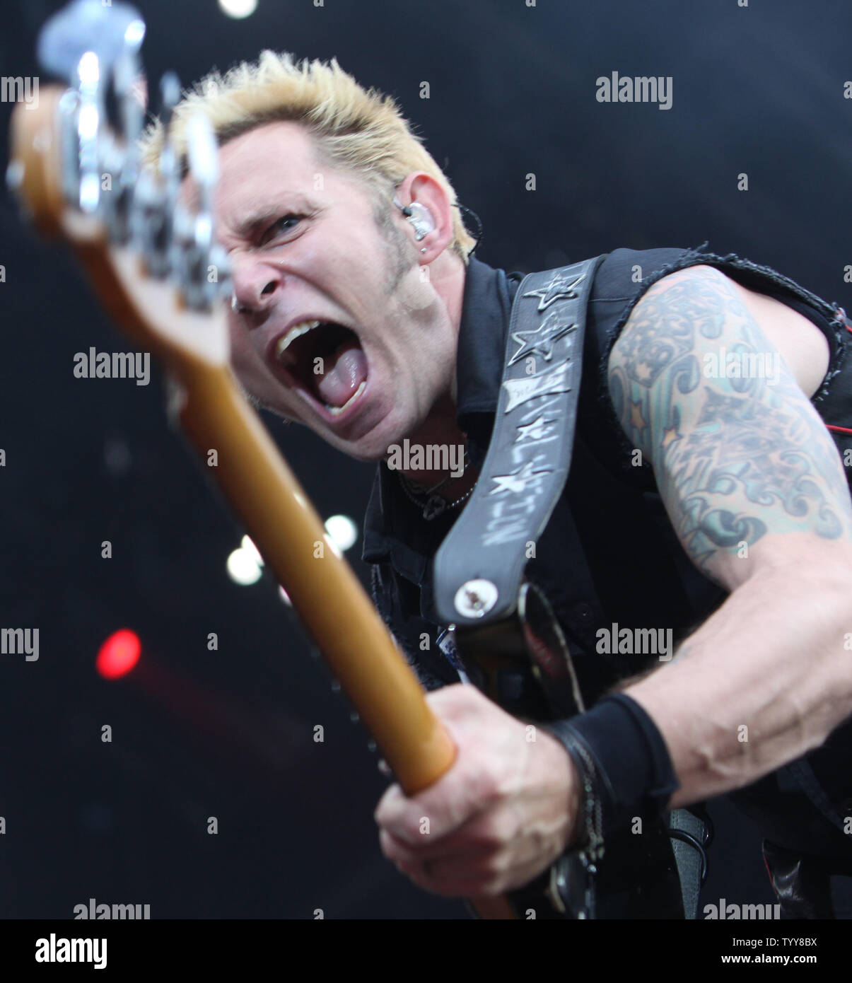 Bassist Mike Dirnt of Green Day performs in concert at the Parc des ...