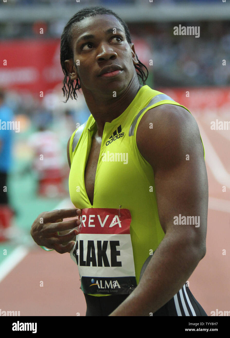 Jamaican Yohan Blake looks for the race results after the men's 100m ...