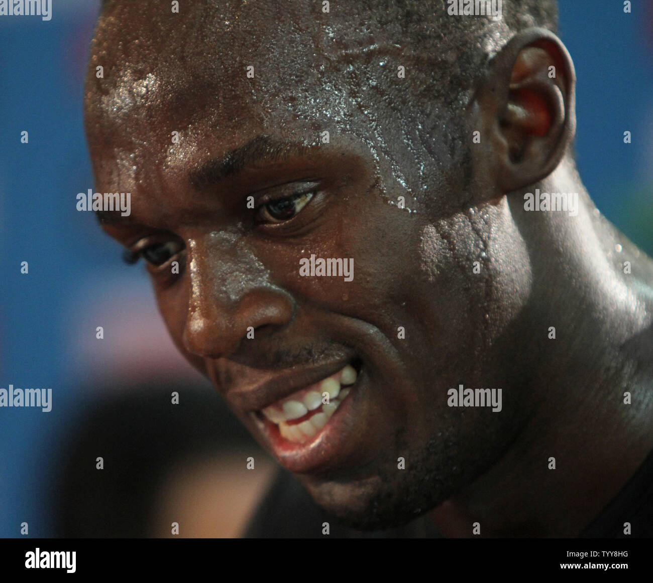 Jamaican Usain Bolt gives an interview after winning the men's 100m ...