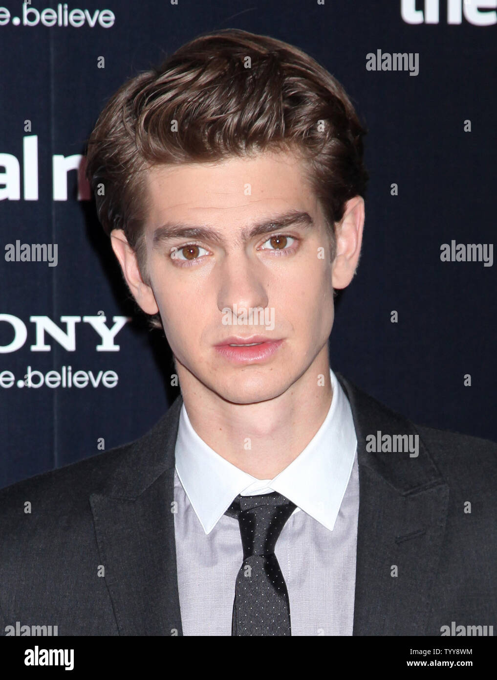 Brenda Song And Andrew Garfield Kiss
