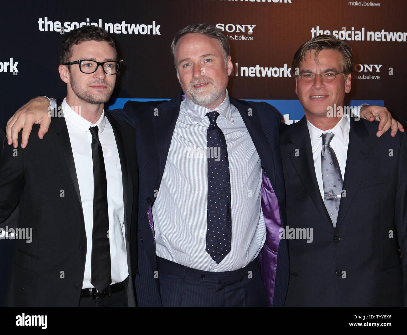 Justin Timberlake (L), David Fincher (C) and Aaron Sorkin arrive at the ...