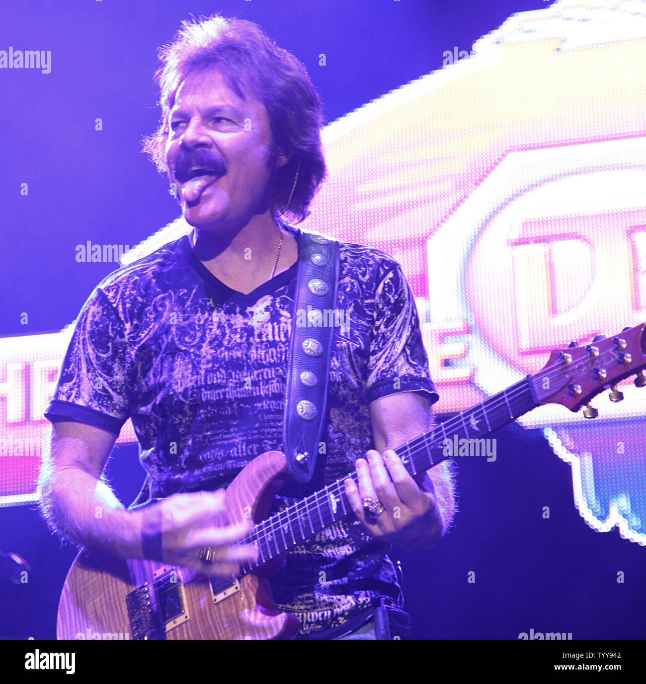 Tom Johnston performs in concert with his band The Doobie Brothers at ...