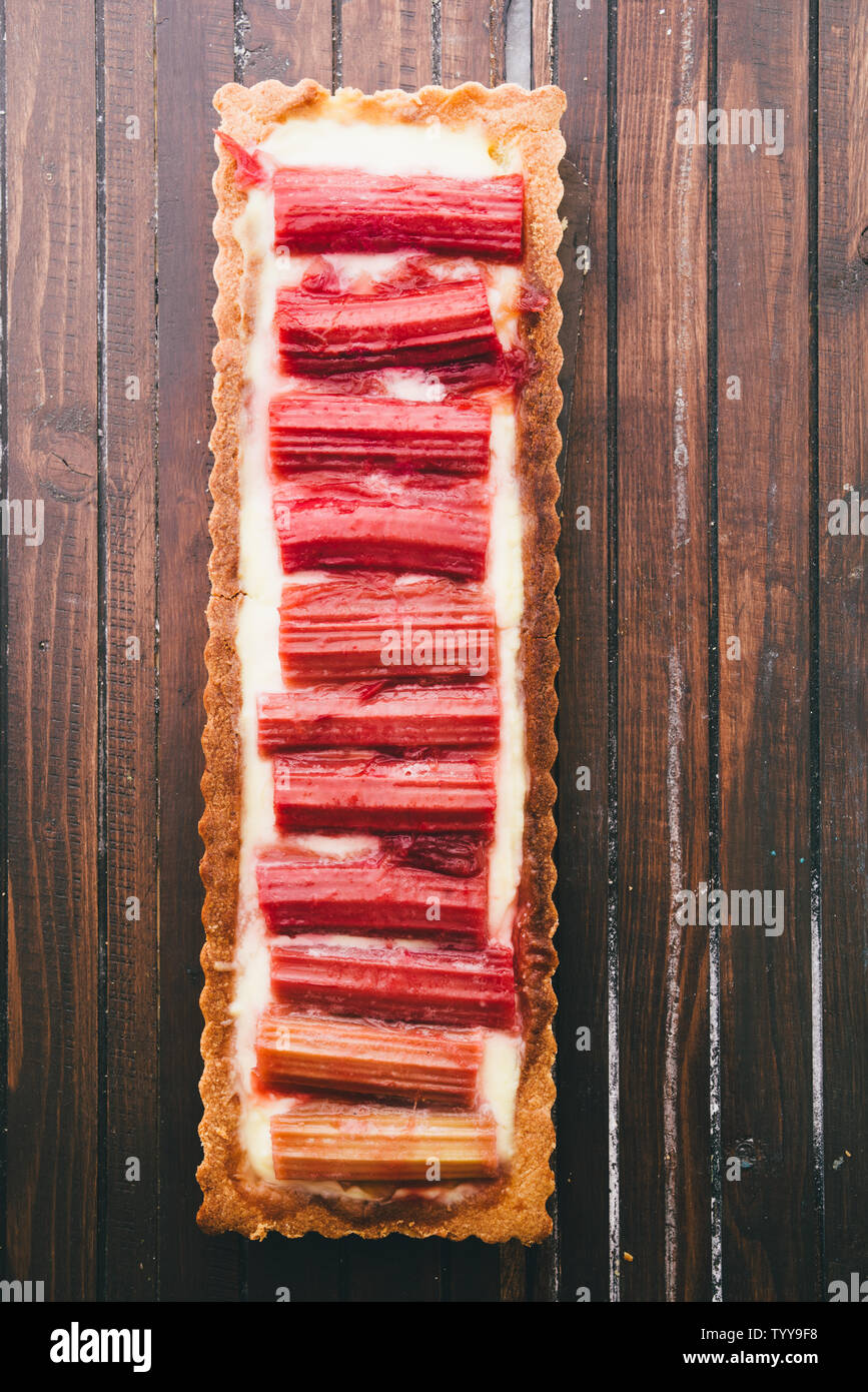 Rhubarb tart wth a rectangular shape, made with an italian crust a ...