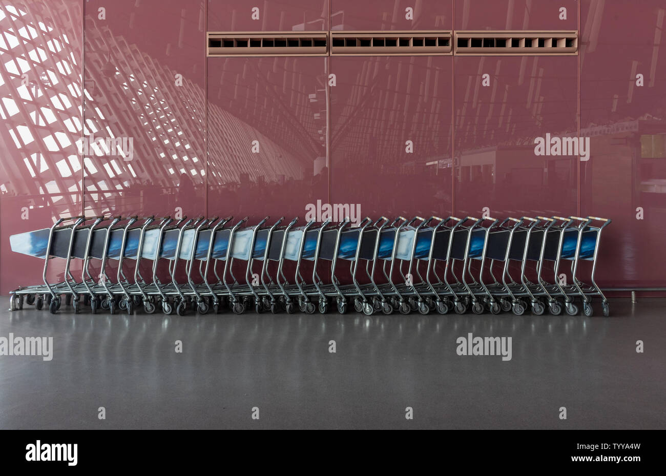 The trolley inside the airport Stock Photo - Alamy