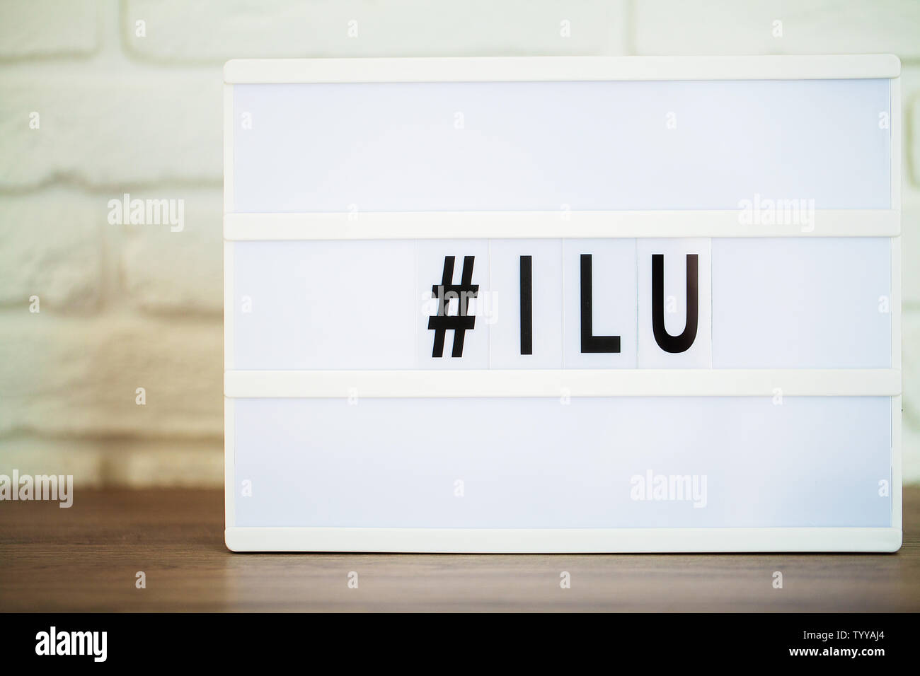 Led letter board with hashtag word on table Stock Photo - Alamy