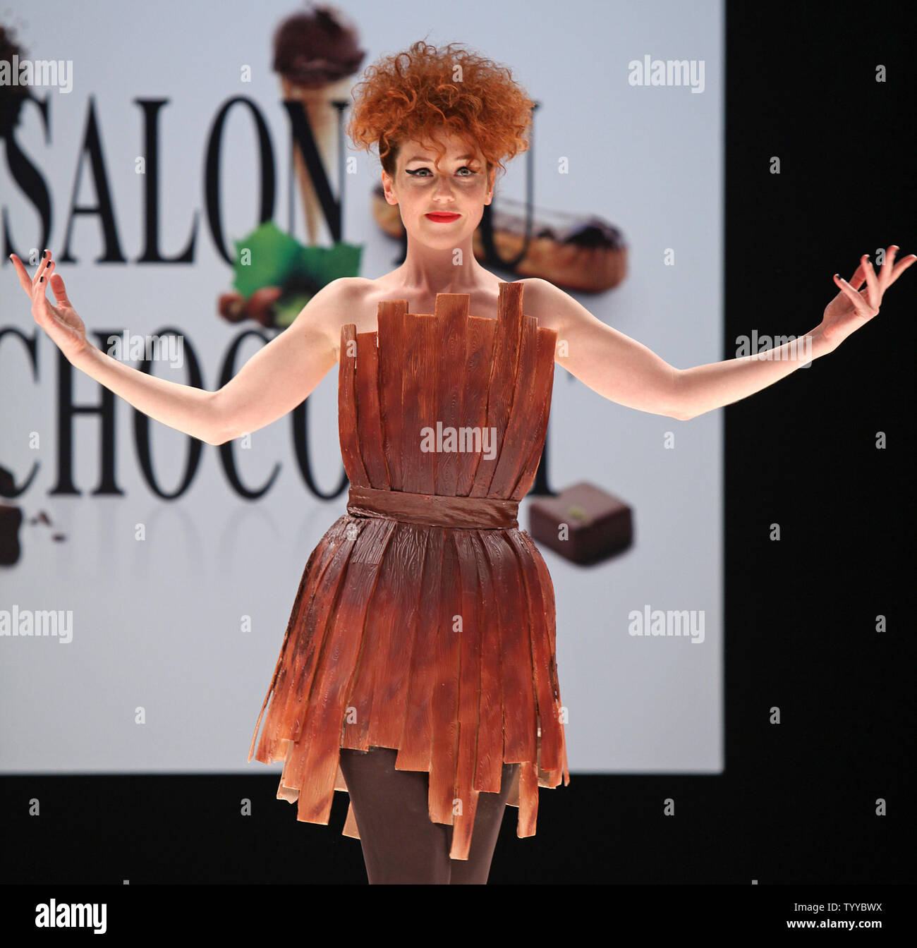 A model wears a creation made with chocolate during a fashion show at ...