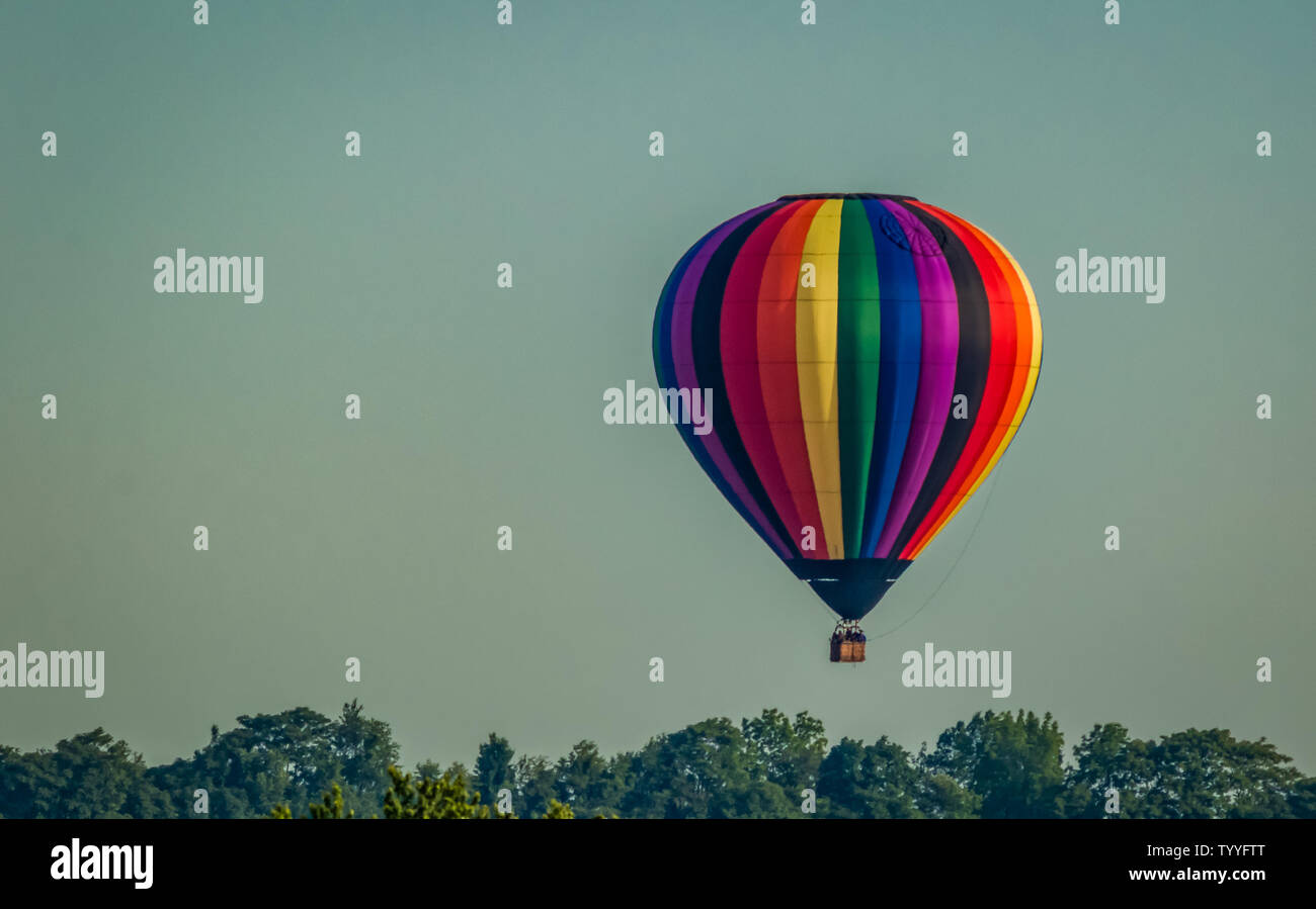 Rainbow colored hot air balloon hi-res stock photography and images - Alamy