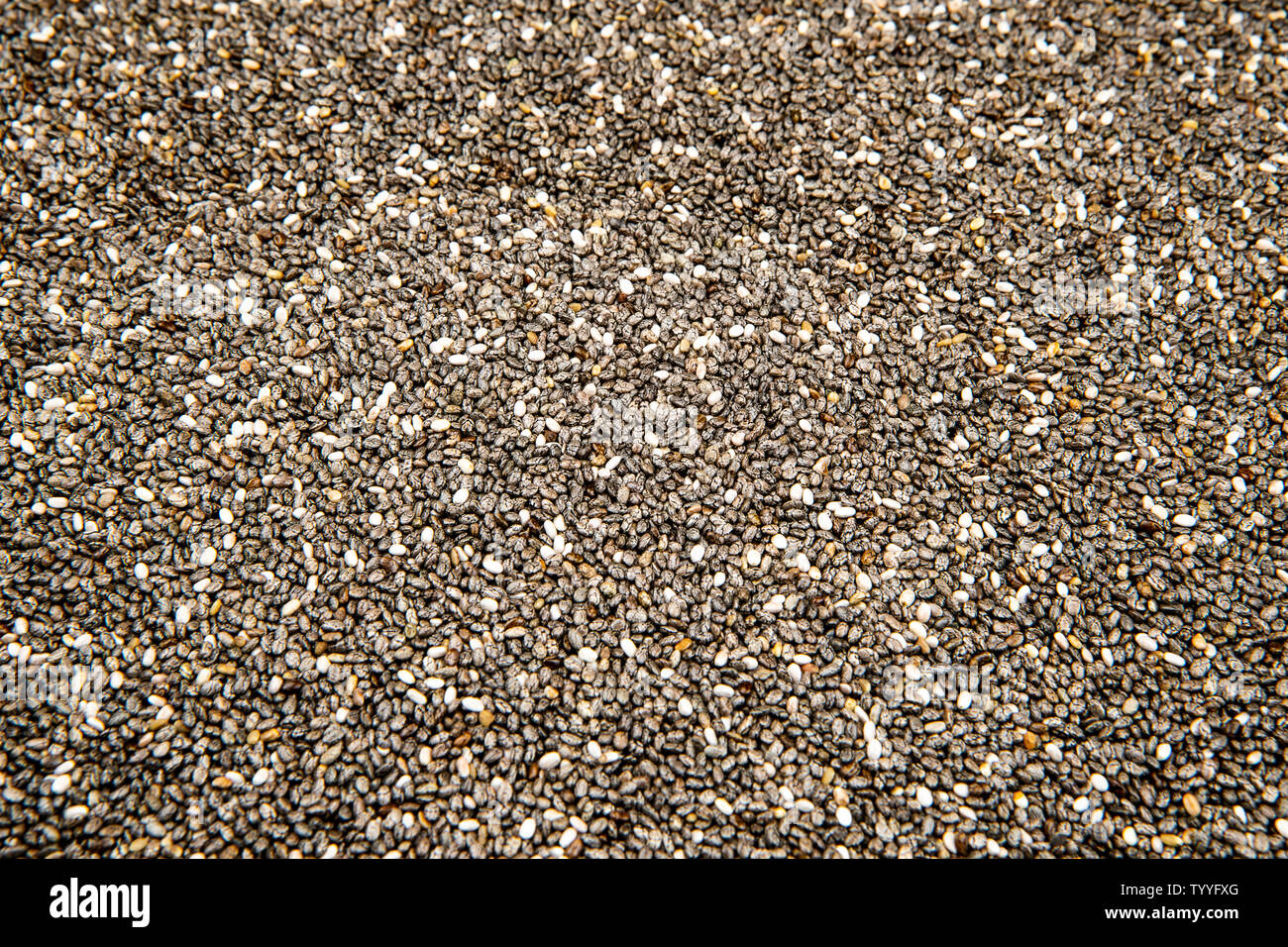 Chia seeds close up. Food background texture Stock Photo - Alamy