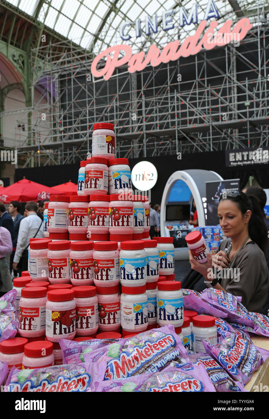 A festival-goer checks out a stand selling American pop culture items ...
