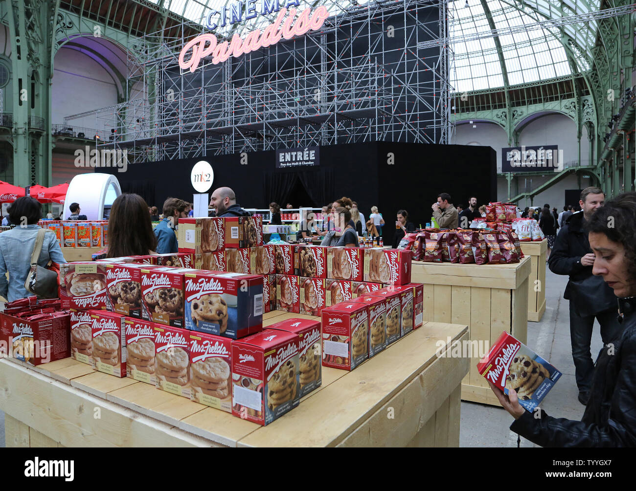 A festival-goer checks out a stand selling American pop culture items ...