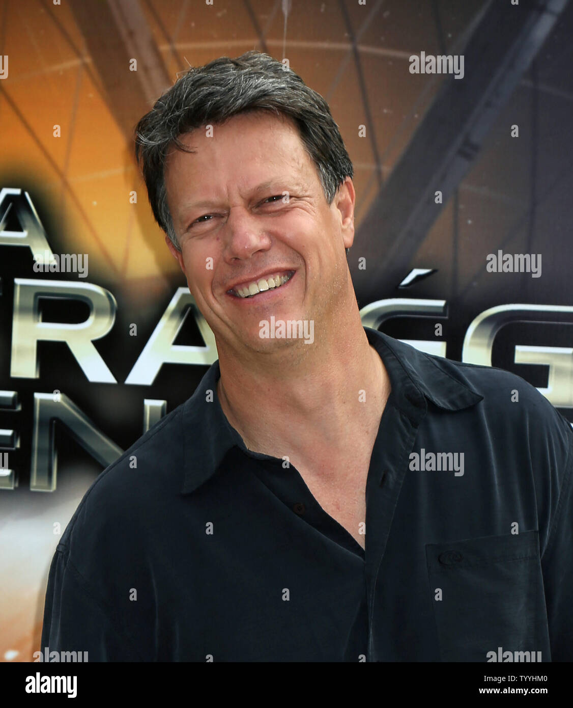 Gavin Hood arrives at a photo call for the film "Ender's Game" in Paris ...