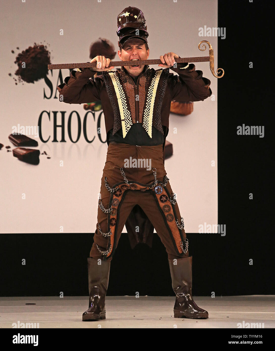 A model wears a creation made with chocolate during a fashion show at ...