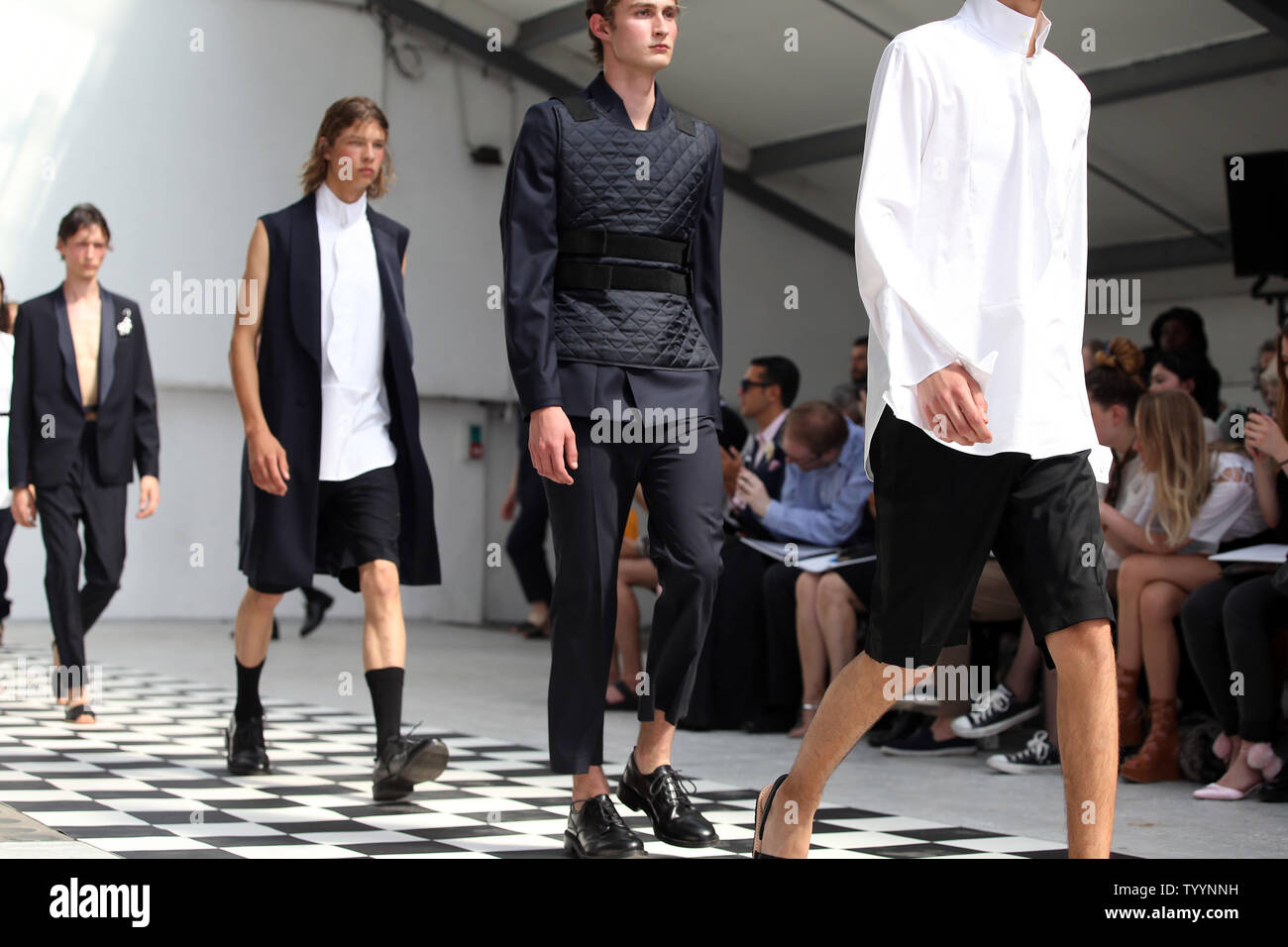 Models line up at the end of the presentation of 22/4's collection as ...