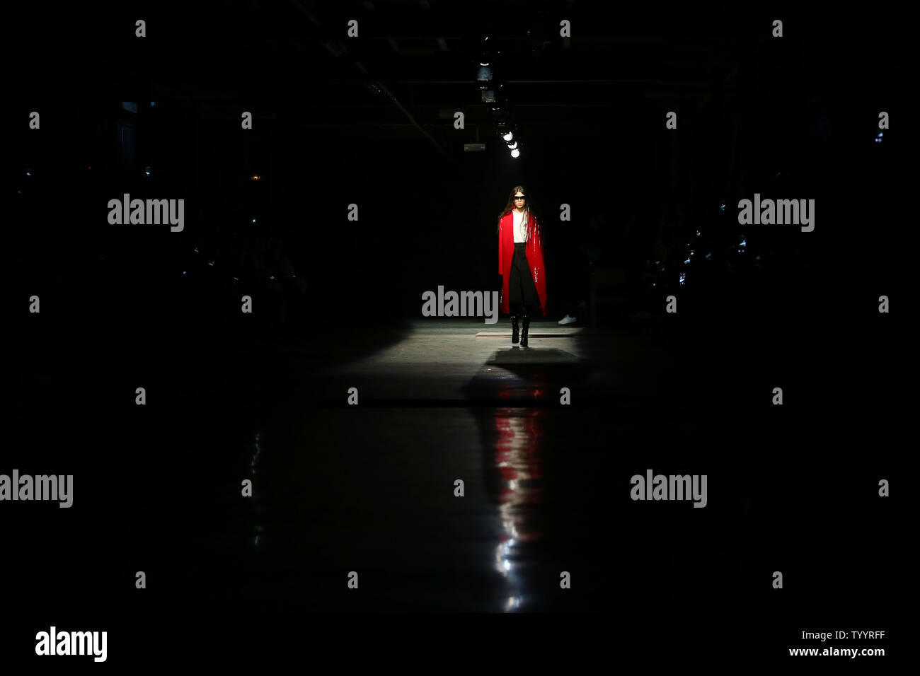 A model takes to the catwalk during the presentation of Wanda Nylon's ...