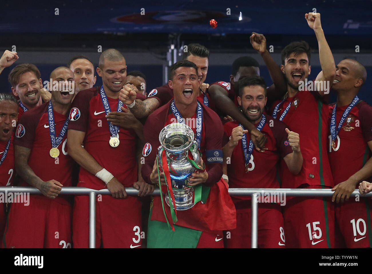 Cristiano Ronaldo of Portugal lifts the trophy following the Euro 2016 ...