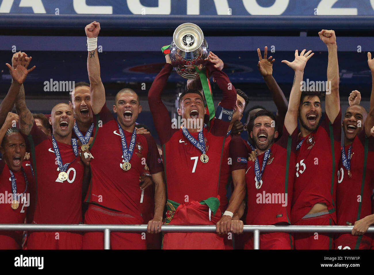Cristiano Ronaldo of Portugal lifts the trophy following the Euro 2016 ...