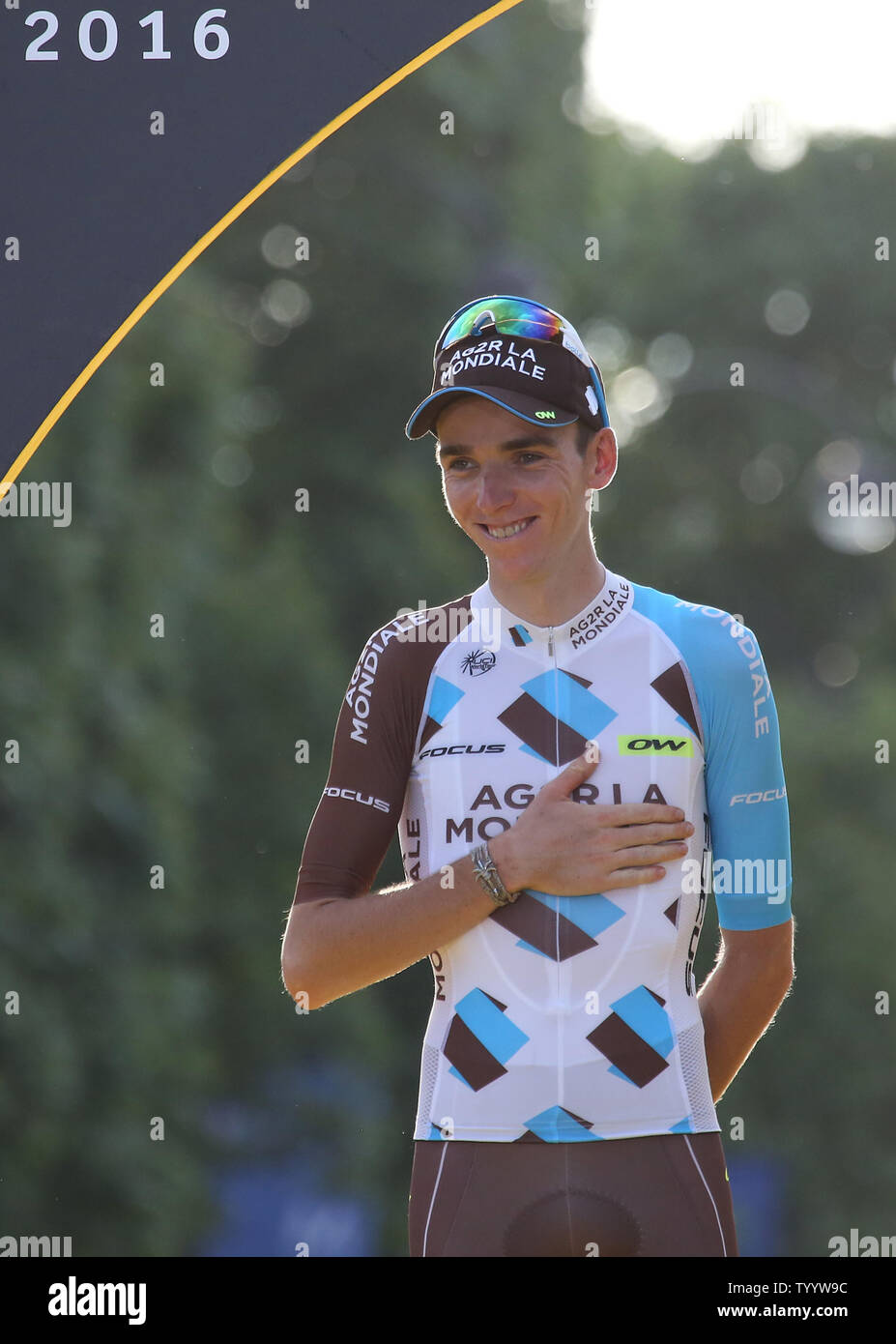 Romain Bardet of France smiles on the presentation podium after ...