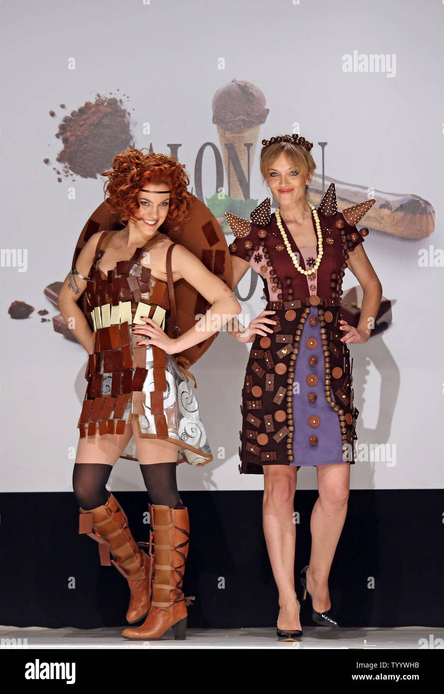 Models wear creations made with chocolate during a fashion show at the ...