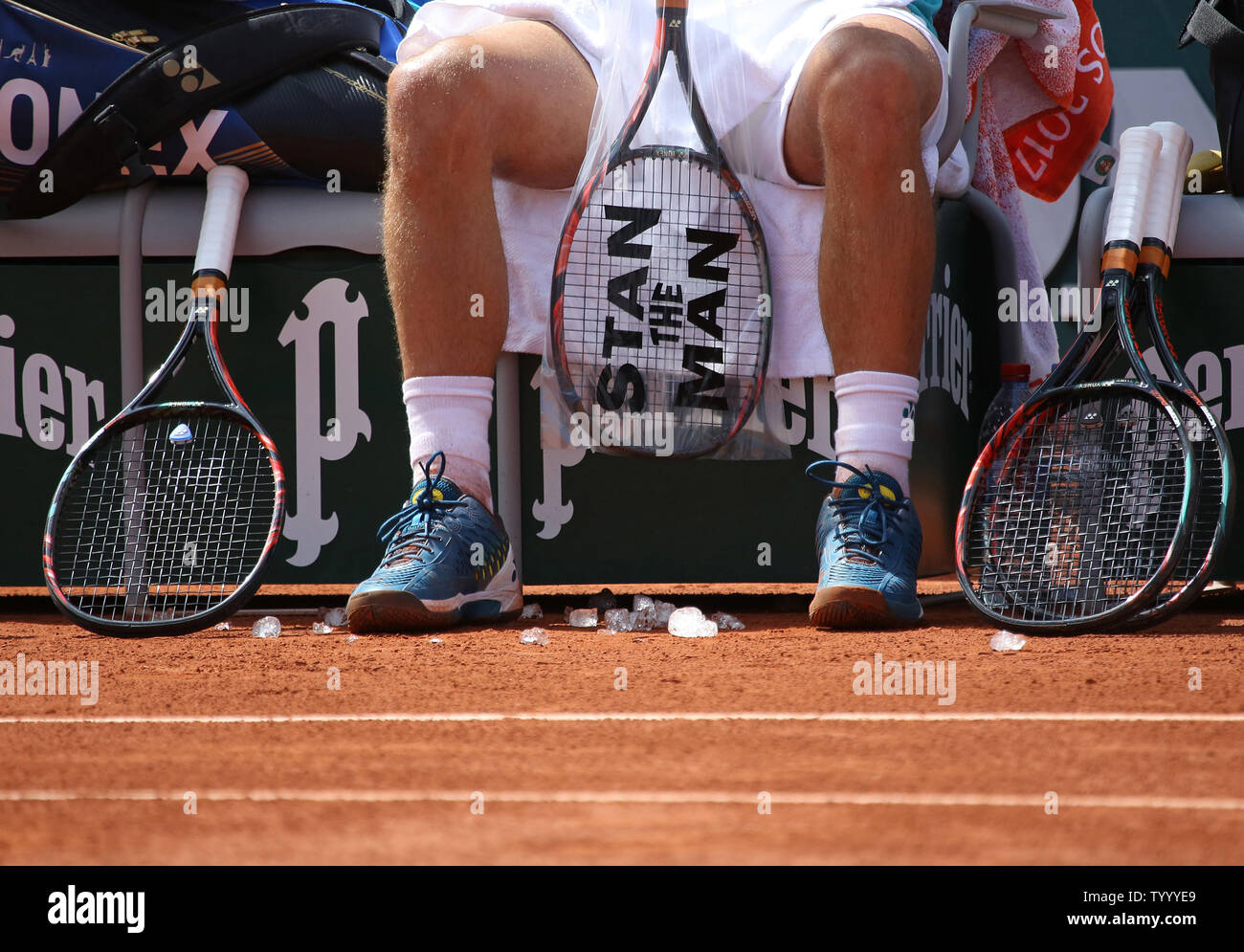 The rackets of Stan Wawrinka of Switzerland are seen during a break in ...