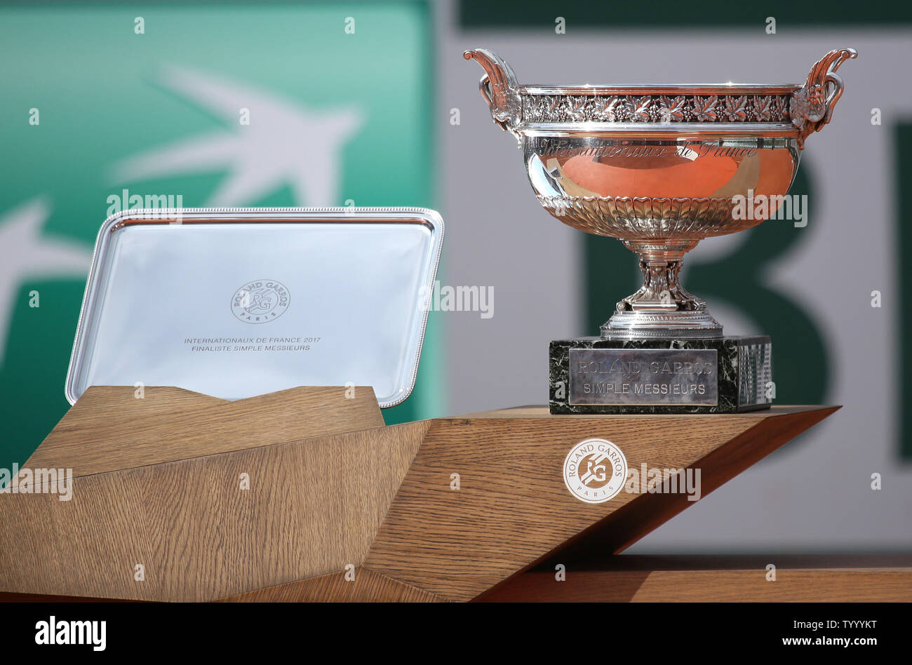 The championship and runners-up trophies are seen on the court after ...