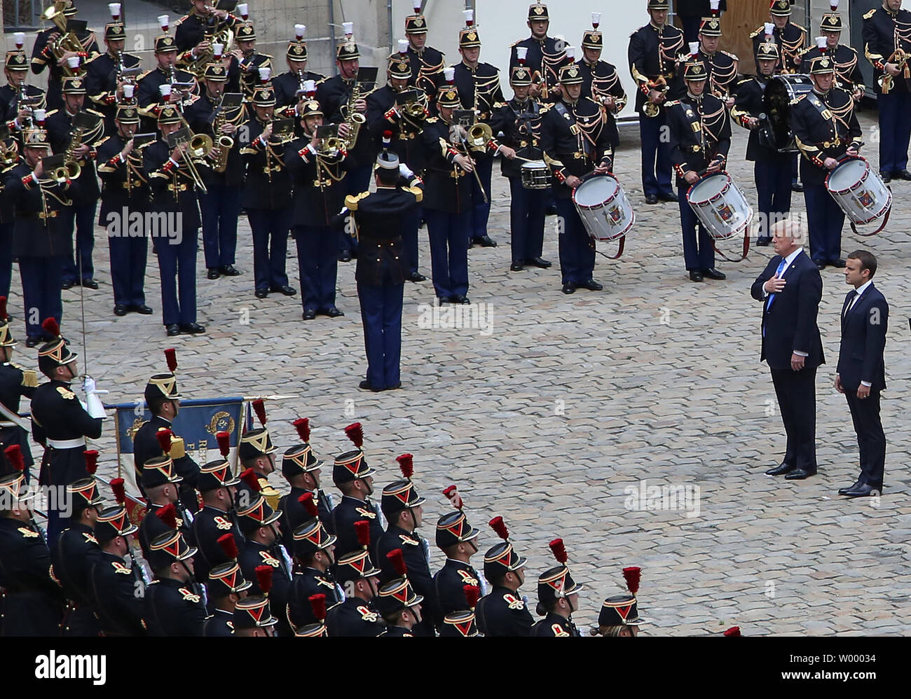 U.S. President Donald Trump (L) and French President Emmanuel Macron ...