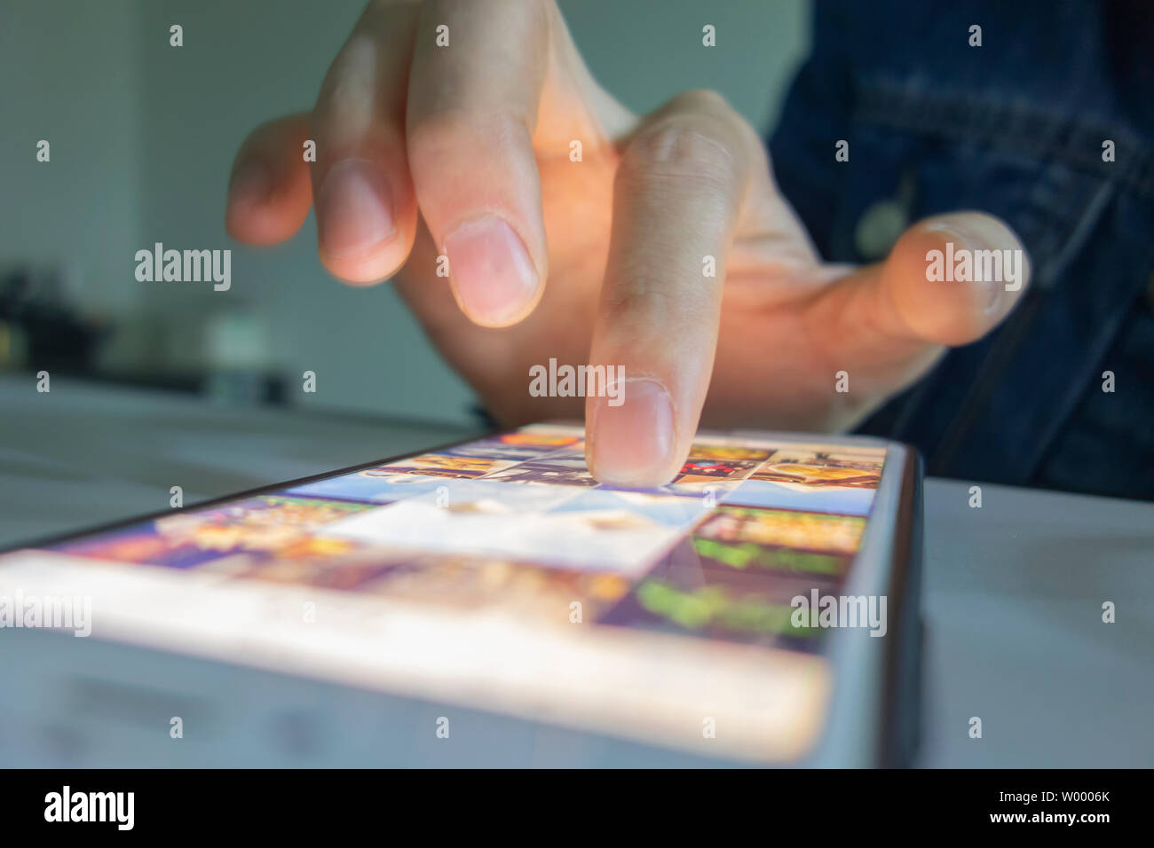Processing images with a mobile phone Stock Photo - Alamy
