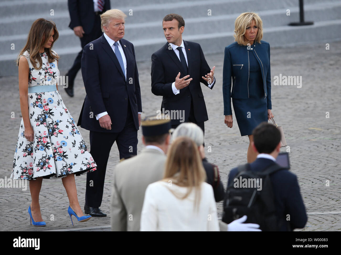 French President Emmanuel Macron (2R) and U.S. President Donald Trump ...