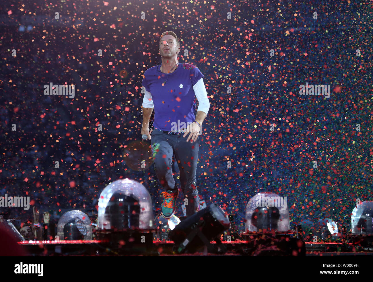 Chris Martin of Coldplay performs in concert at the Stade de France ...