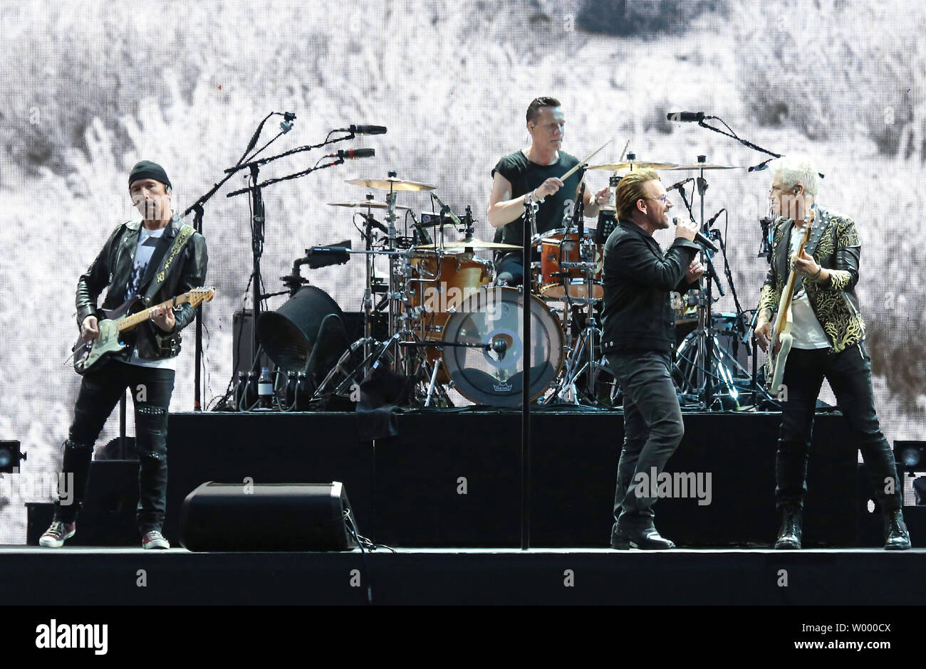 U2 members (From L to R) The Edge, Larry Mullen Jr, Bono and Adam ...