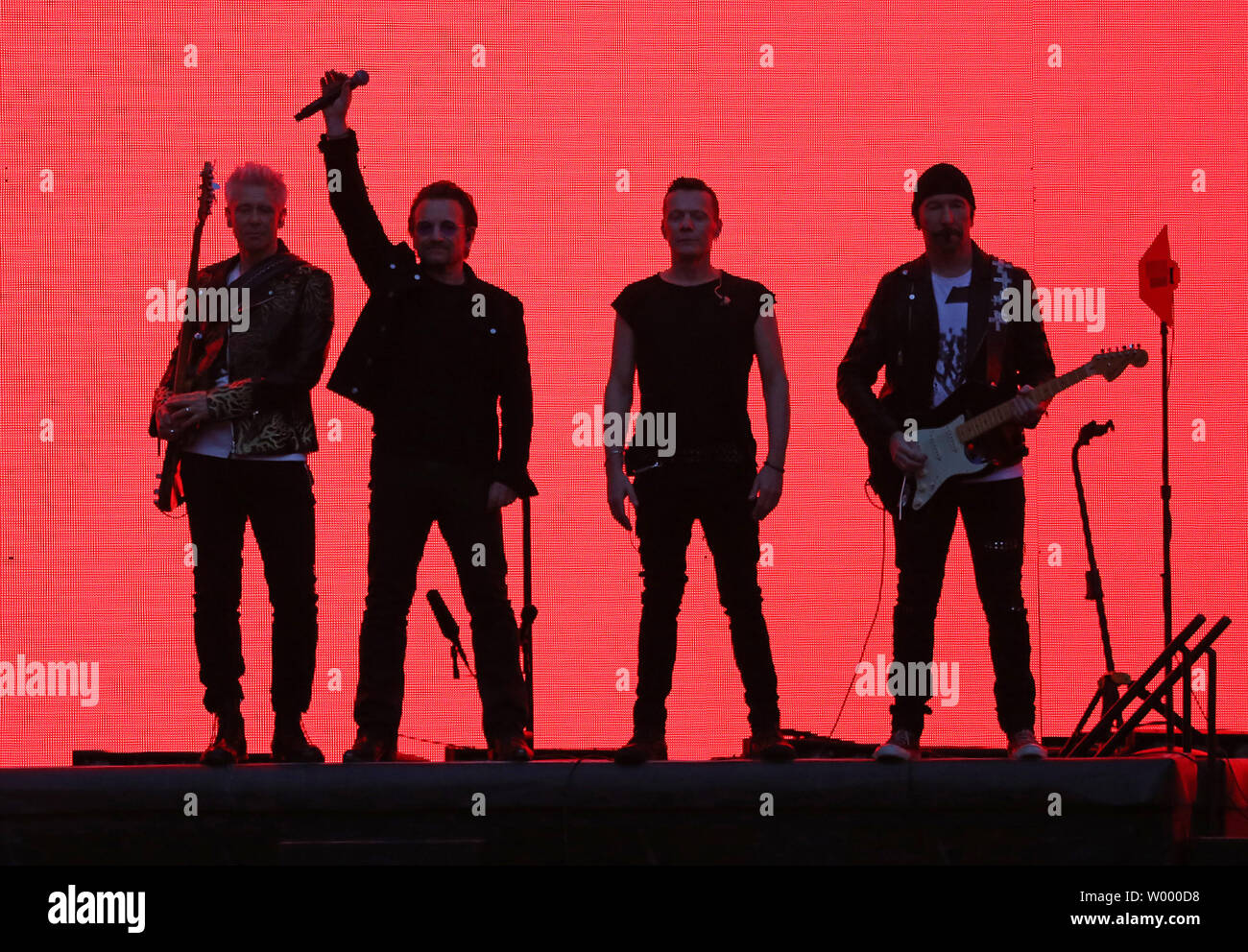 U2 members (From L to R) Adam Clayton, Bono, Larry Mullen Jr and The ...