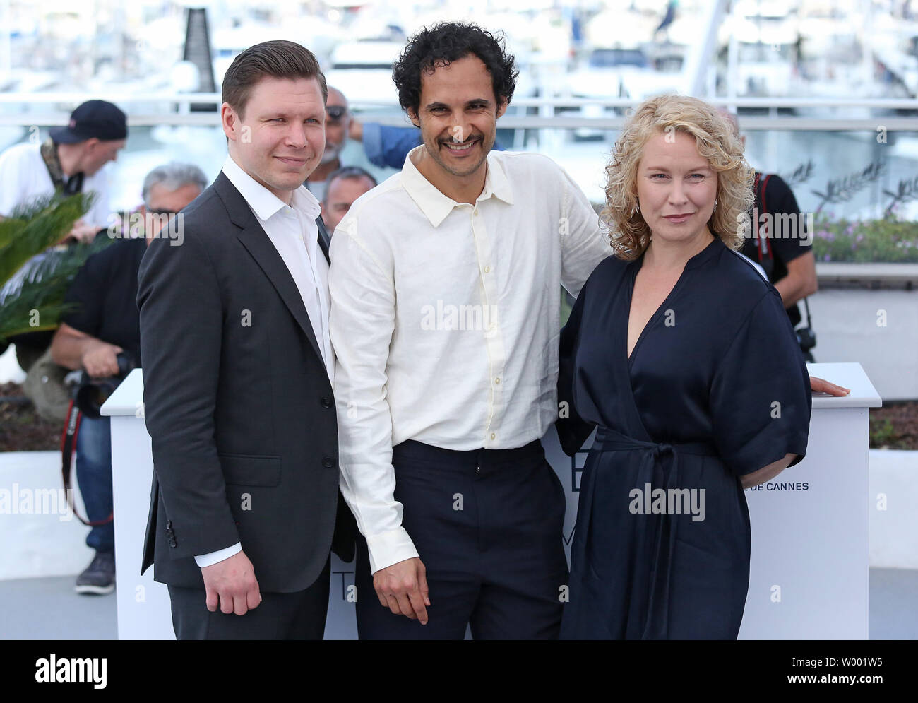 Eero Milonoff (L), Ali Abbasi (C) and Eva Melander arrive at a ...